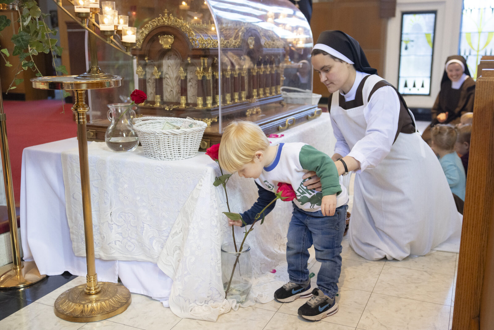 Faithful flock to the Little Flower as relics stop in St. Louis - St ...